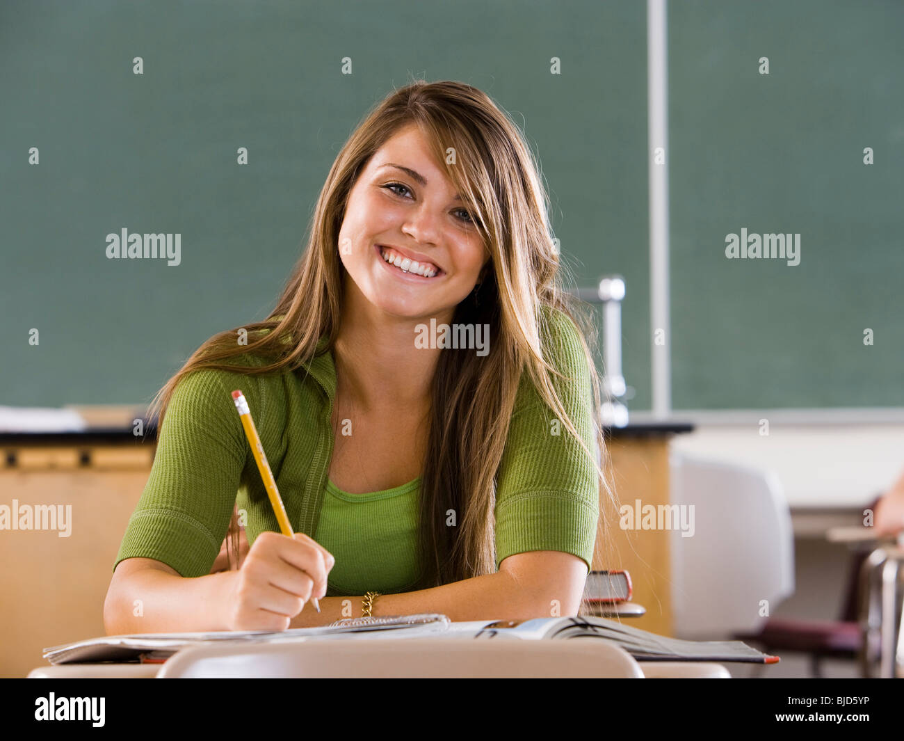 Student in a classroom Stock Photo - Alamy