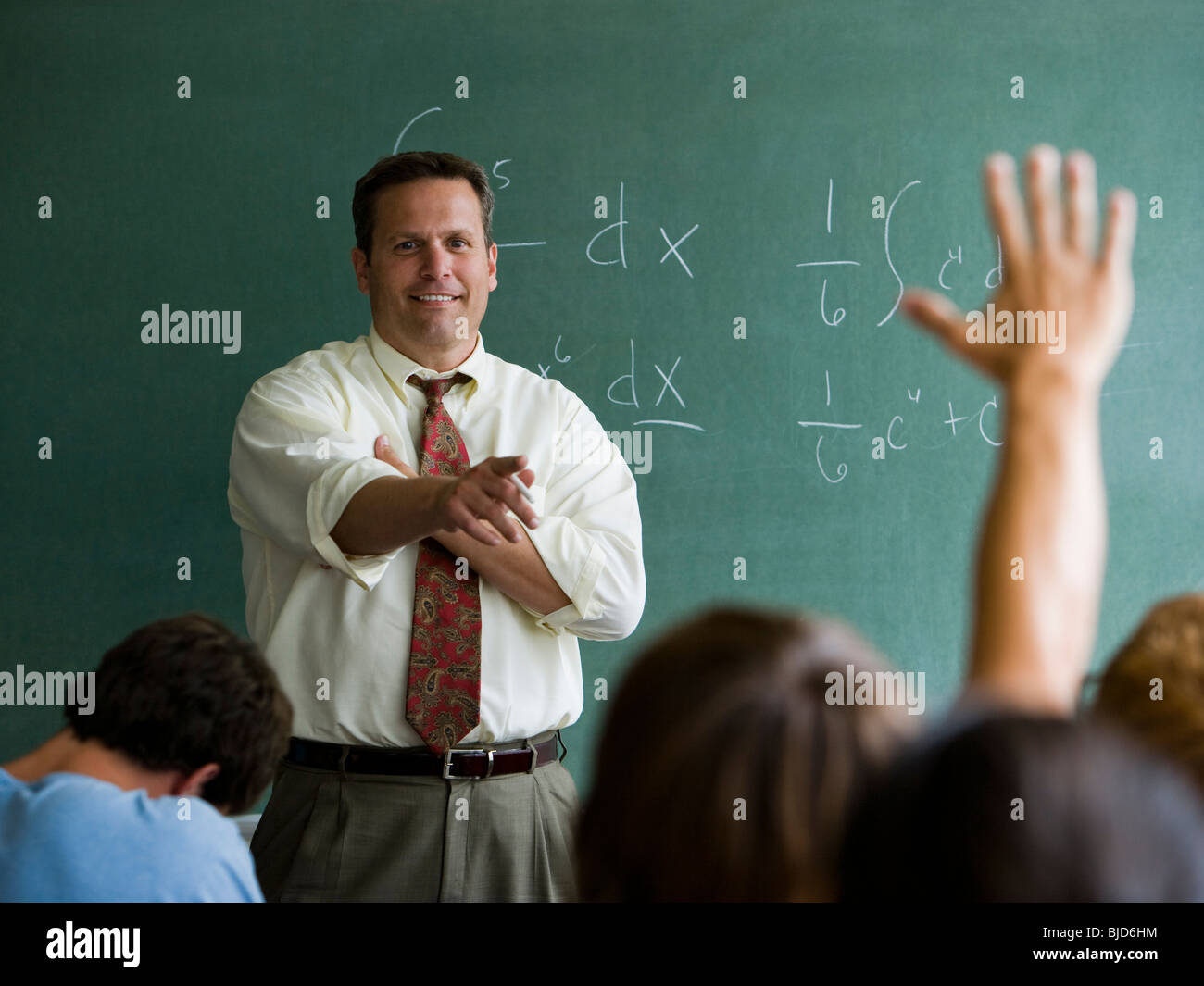 Teacher in a classroom Stock Photo - Alamy