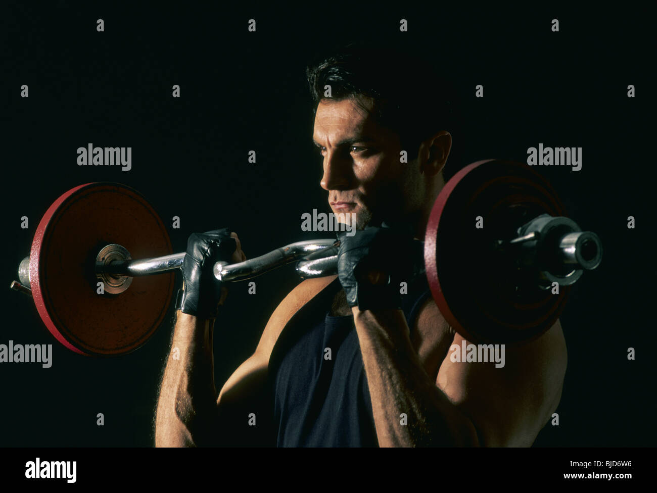 exercising with free weight Stock Photo - Alamy