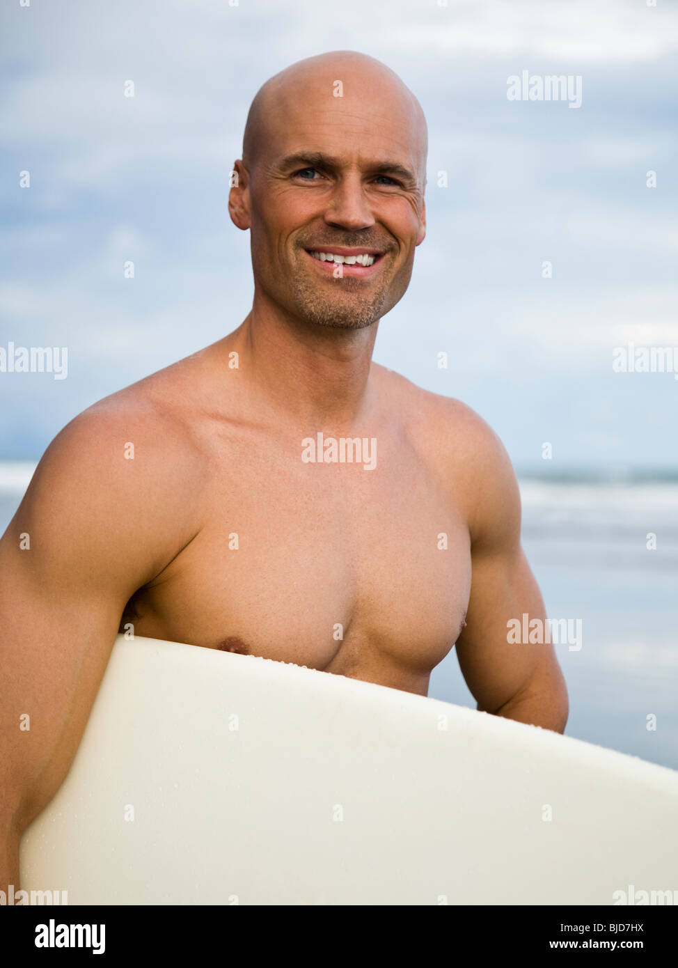 Man at the beach Stock Photo - Alamy