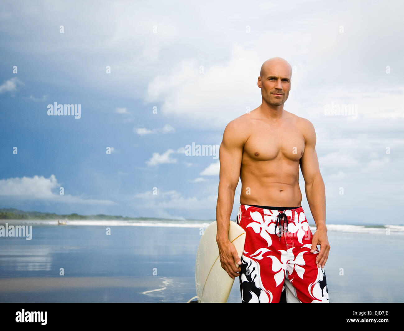 Man at the beach Stock Photo - Alamy