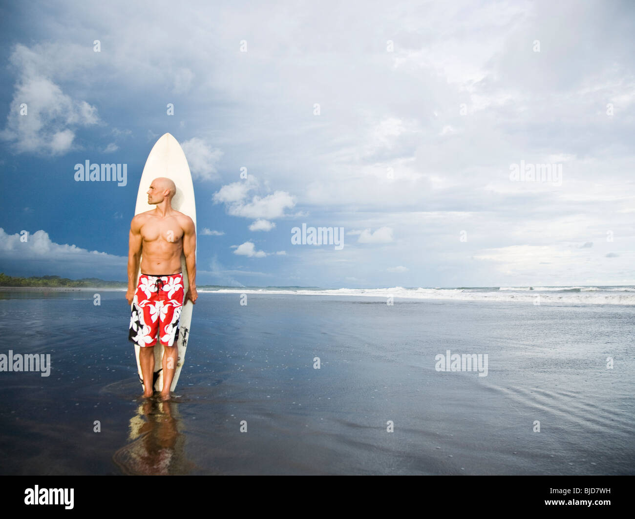 Man at the beach Stock Photo - Alamy