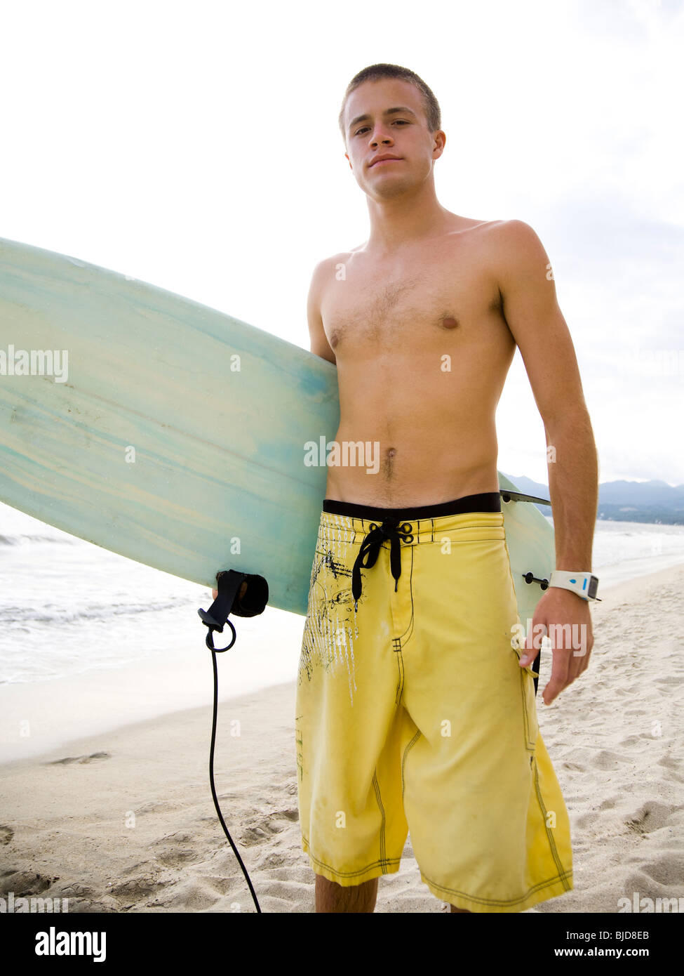Man at the beach Stock Photo - Alamy