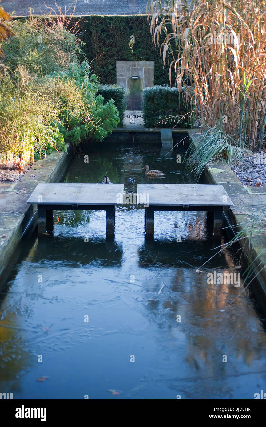 Ice covered garden pond, RHS Wisley Stock Photo - Alamy