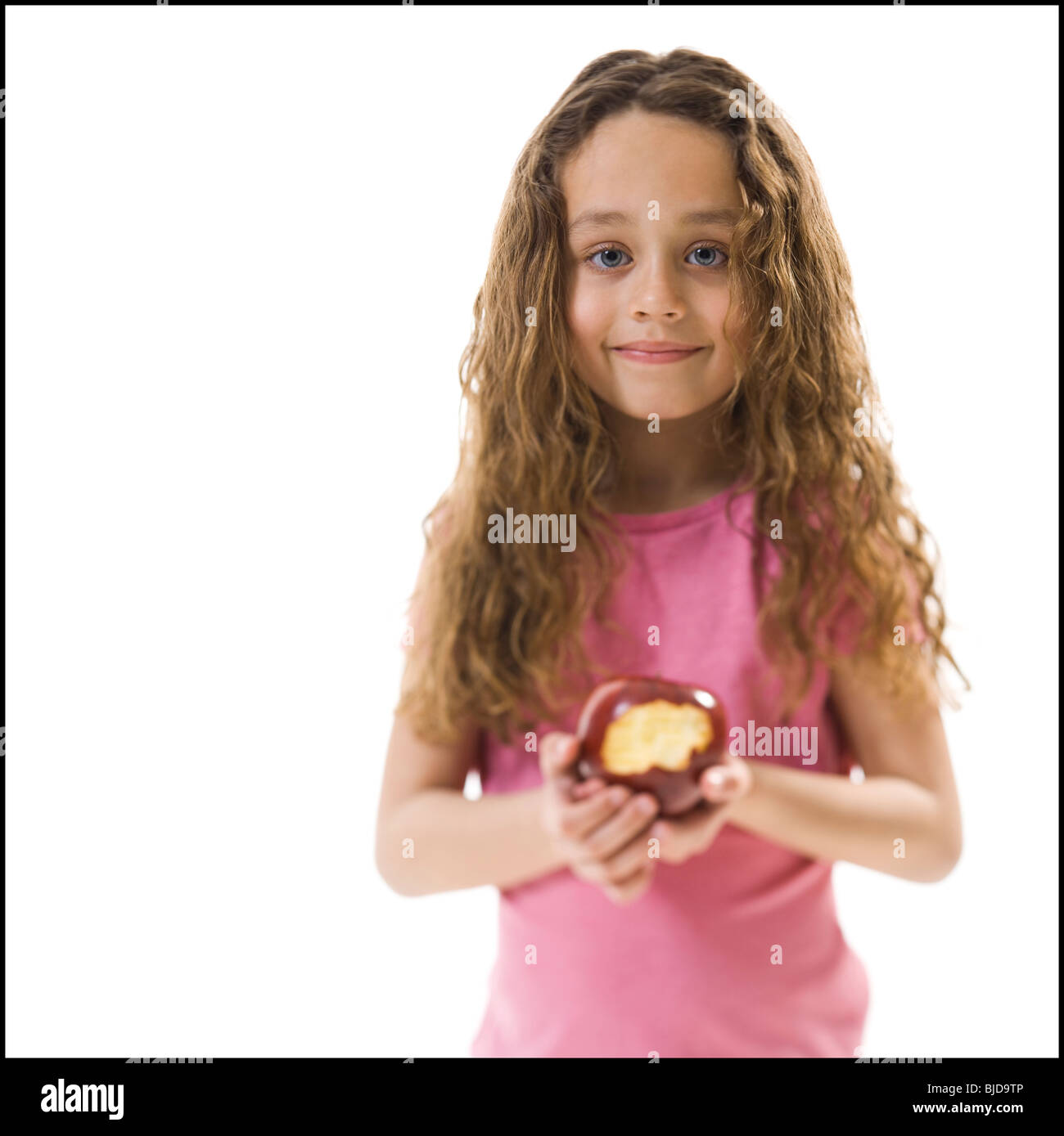 Hispanic girl eating apple hi-res stock photography and images - Alamy
