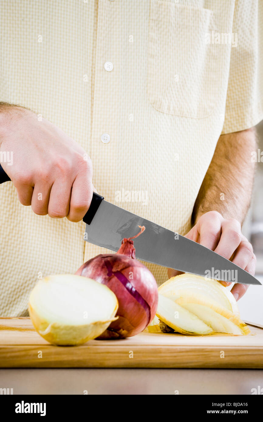 man cutting food Stock Photo - Alamy