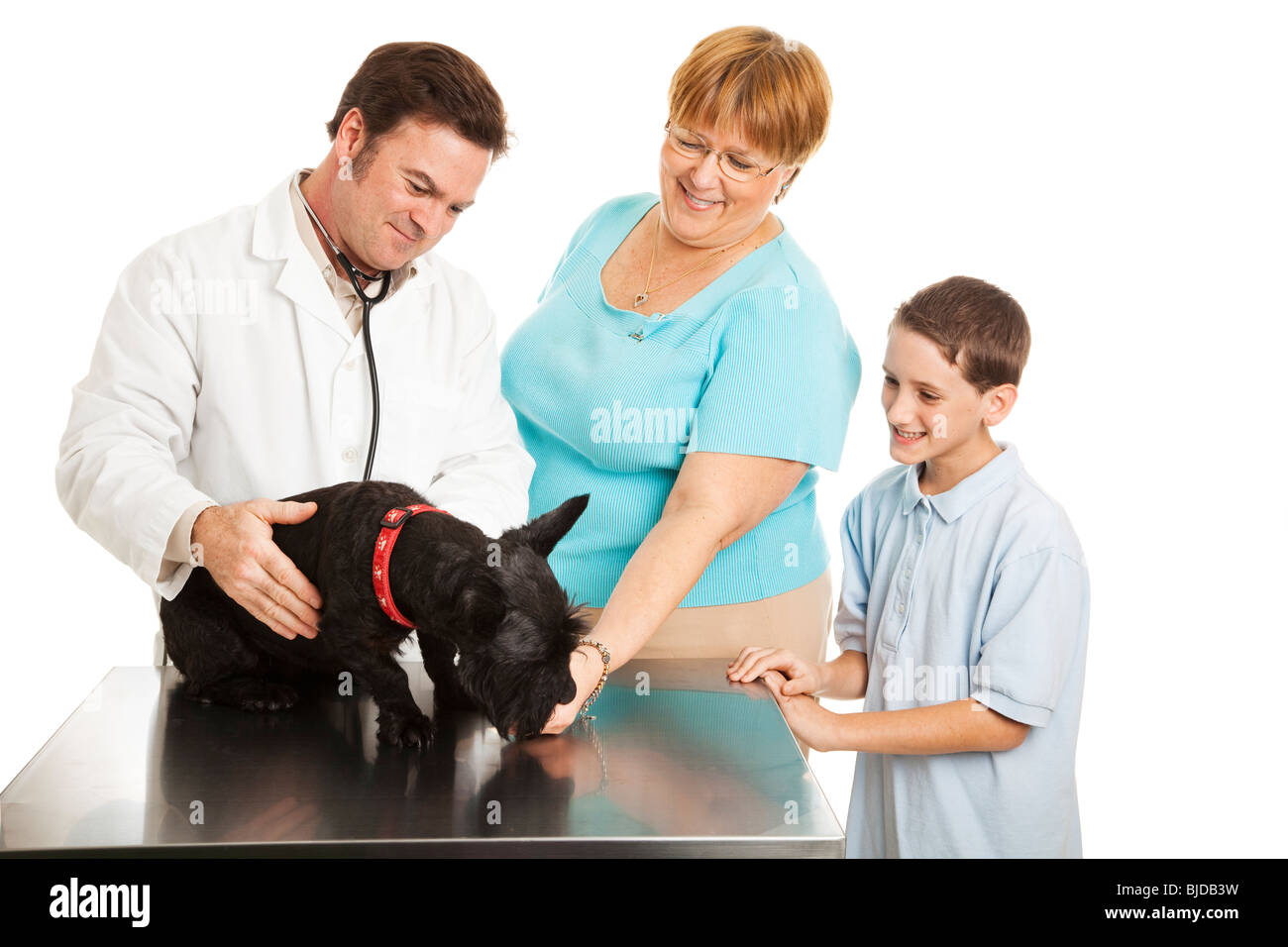 Mother and son take their pet Scotty dog to the veterinarian. Isolated ...