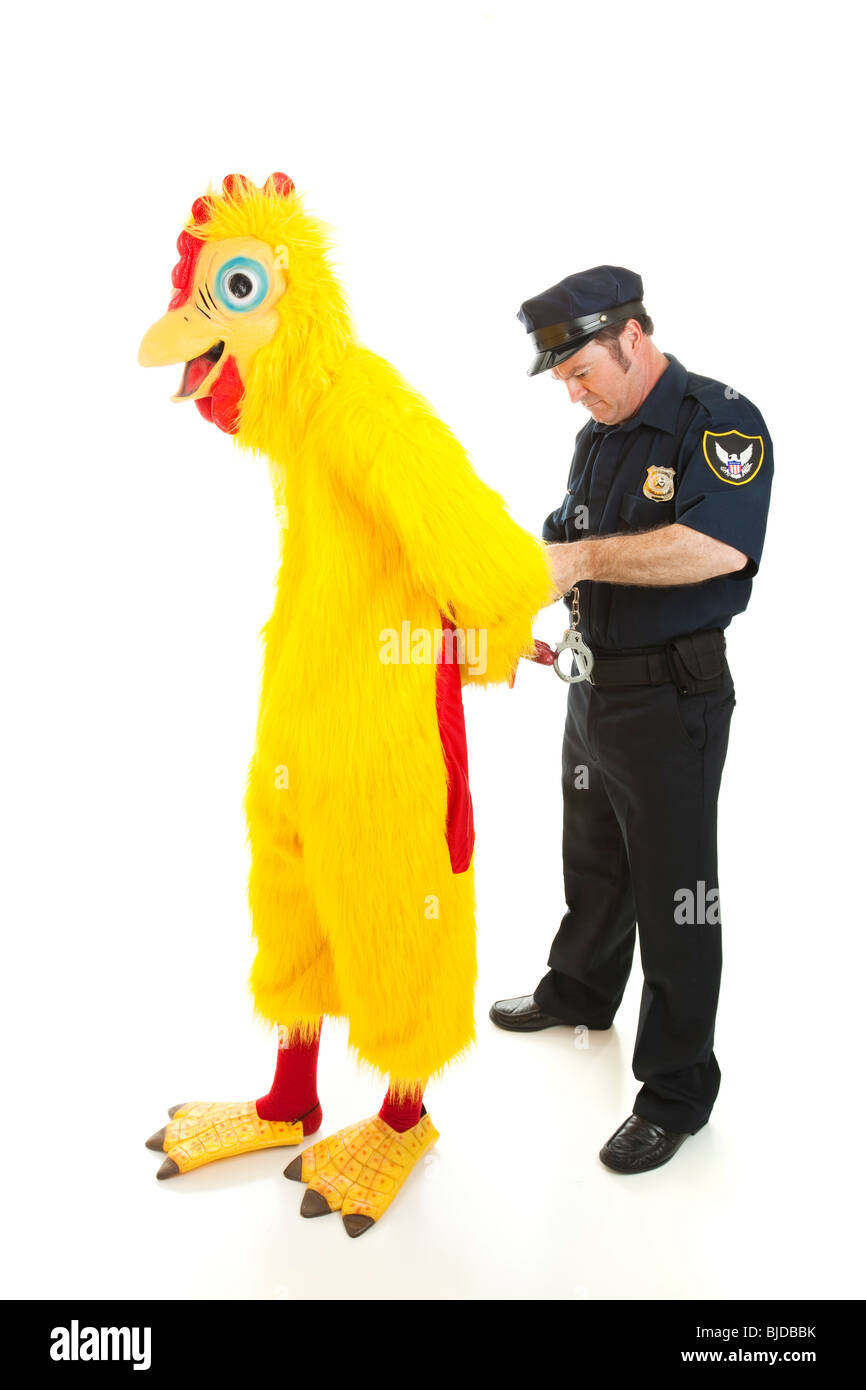 Man dressed as a chicken is being placed in handcuffs by a police ...