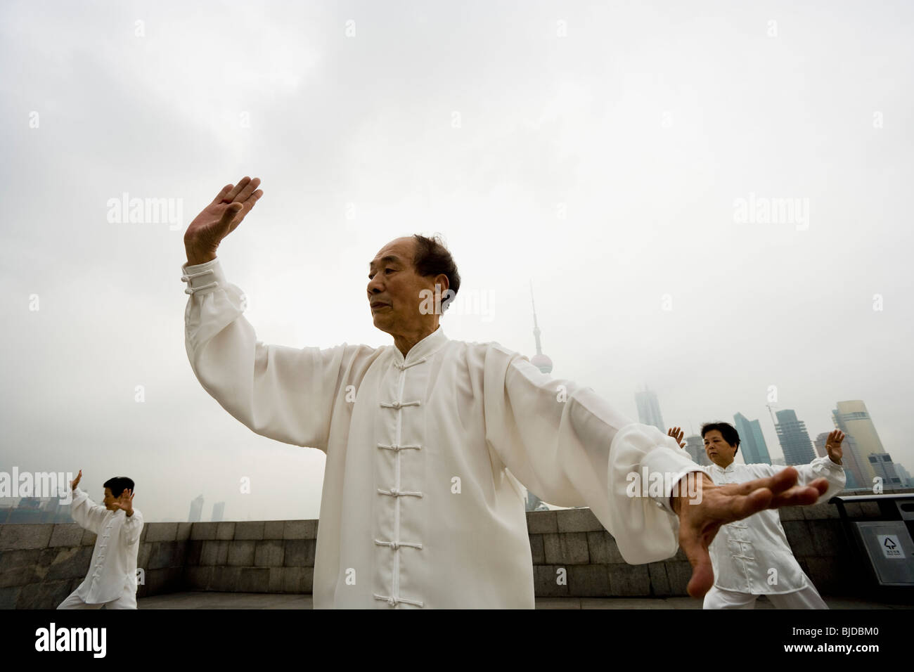 People practicing Tai Chi Stock Photo - Alamy