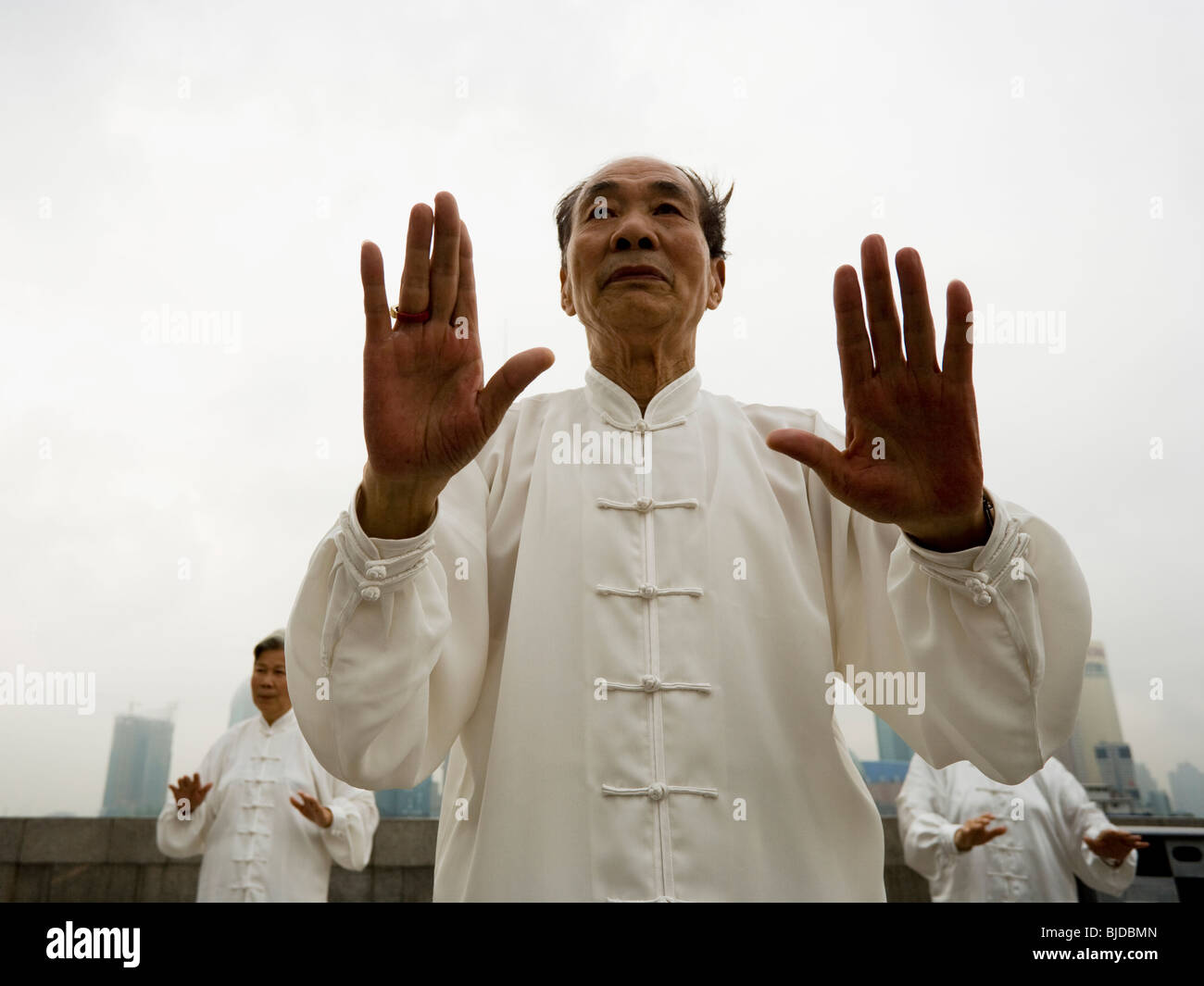 People practicing Tai Chi Stock Photo - Alamy