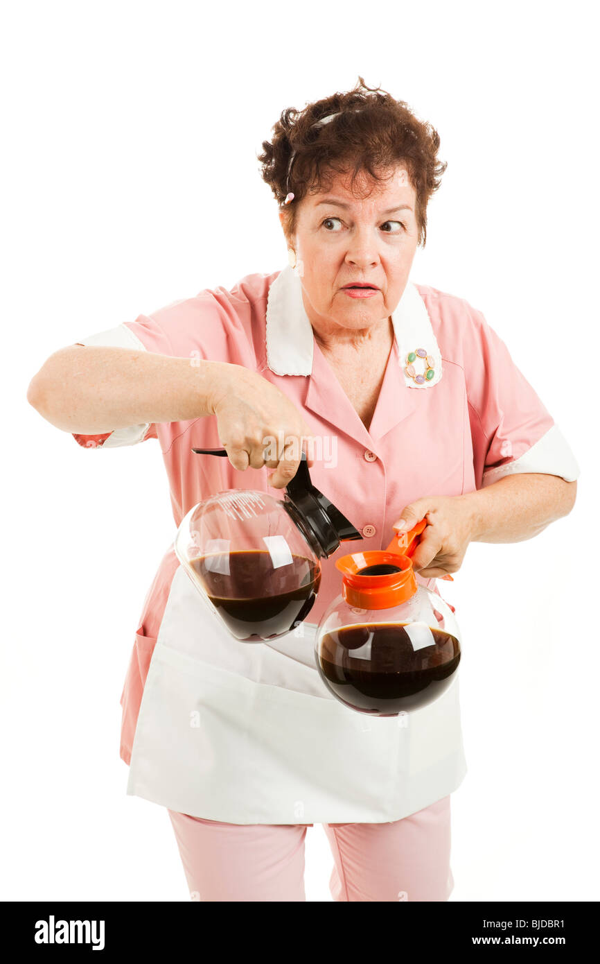 Sneaky waitress substitutes caffeinated coffee for the decaf. Isolated ...