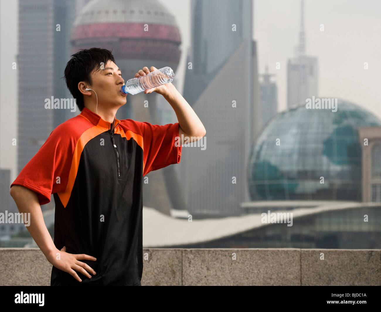 Man drinking bottled water Stock Photo - Alamy