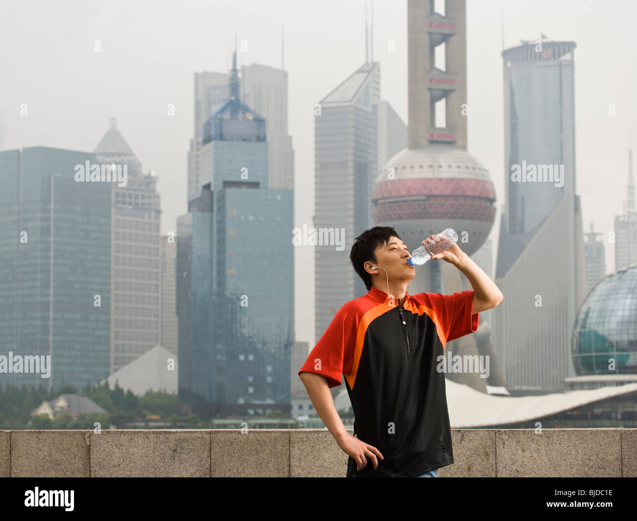 Man drinking bottled water Stock Photo - Alamy