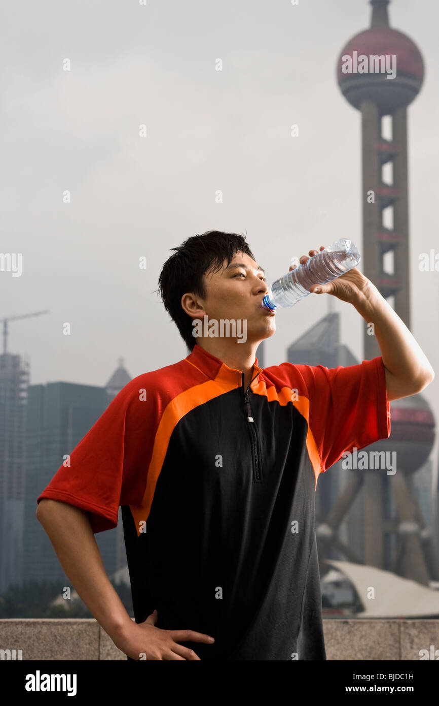 Man drinking bottled water Stock Photo - Alamy
