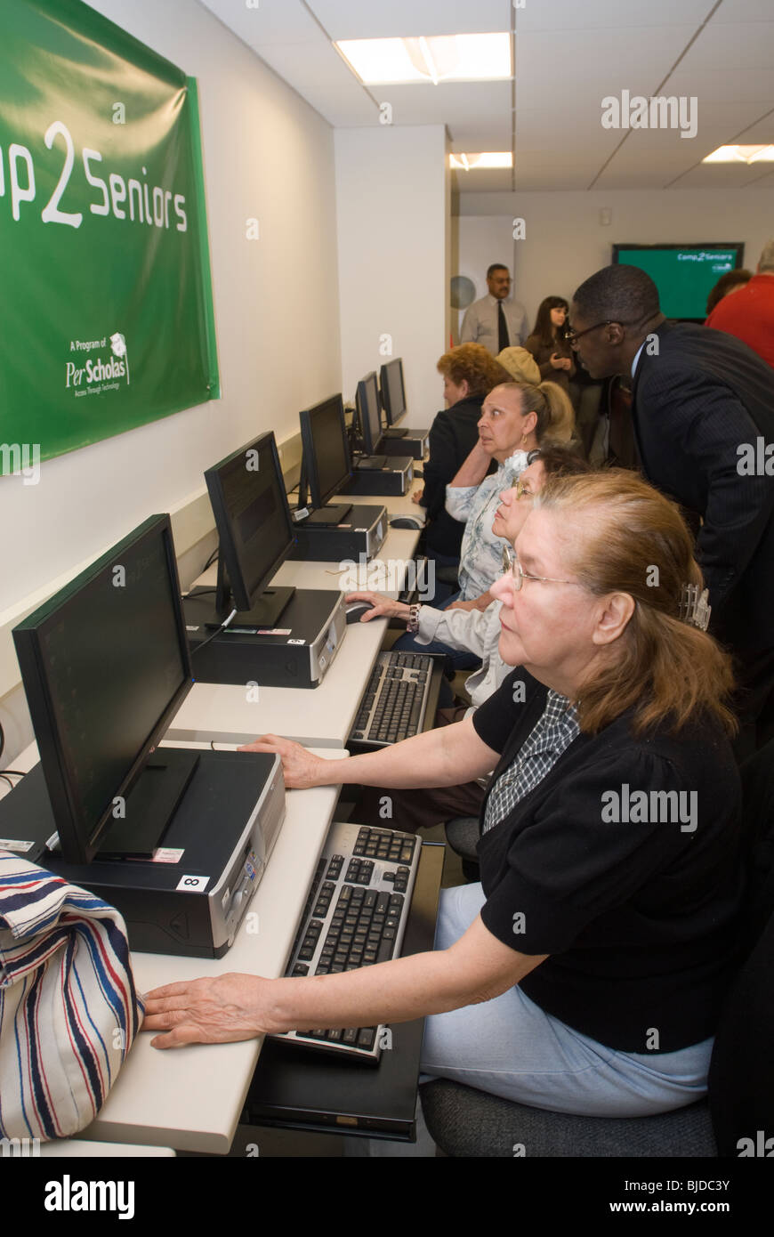 Senior citizens use computers at a senior center in the Bronx borough ...