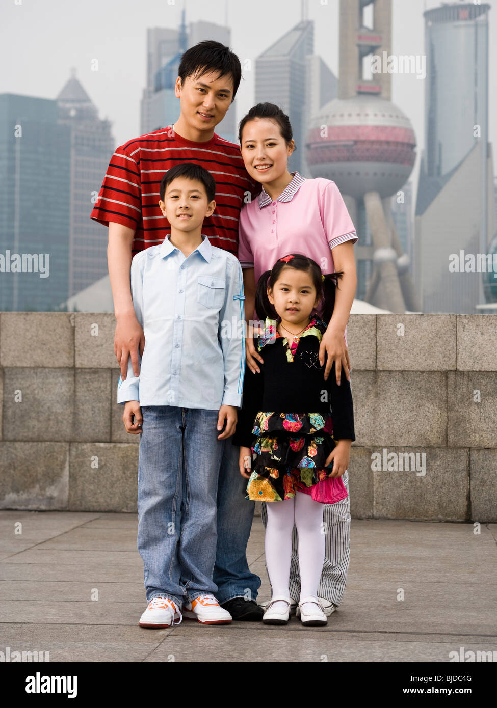 Family of four Stock Photo - Alamy