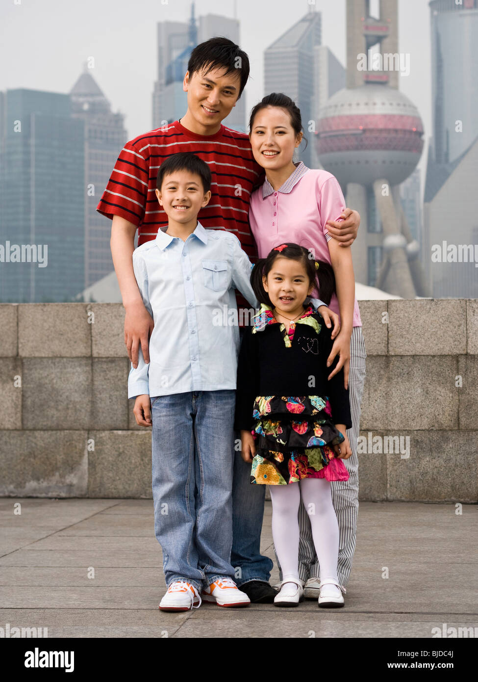 Family of four Stock Photo - Alamy