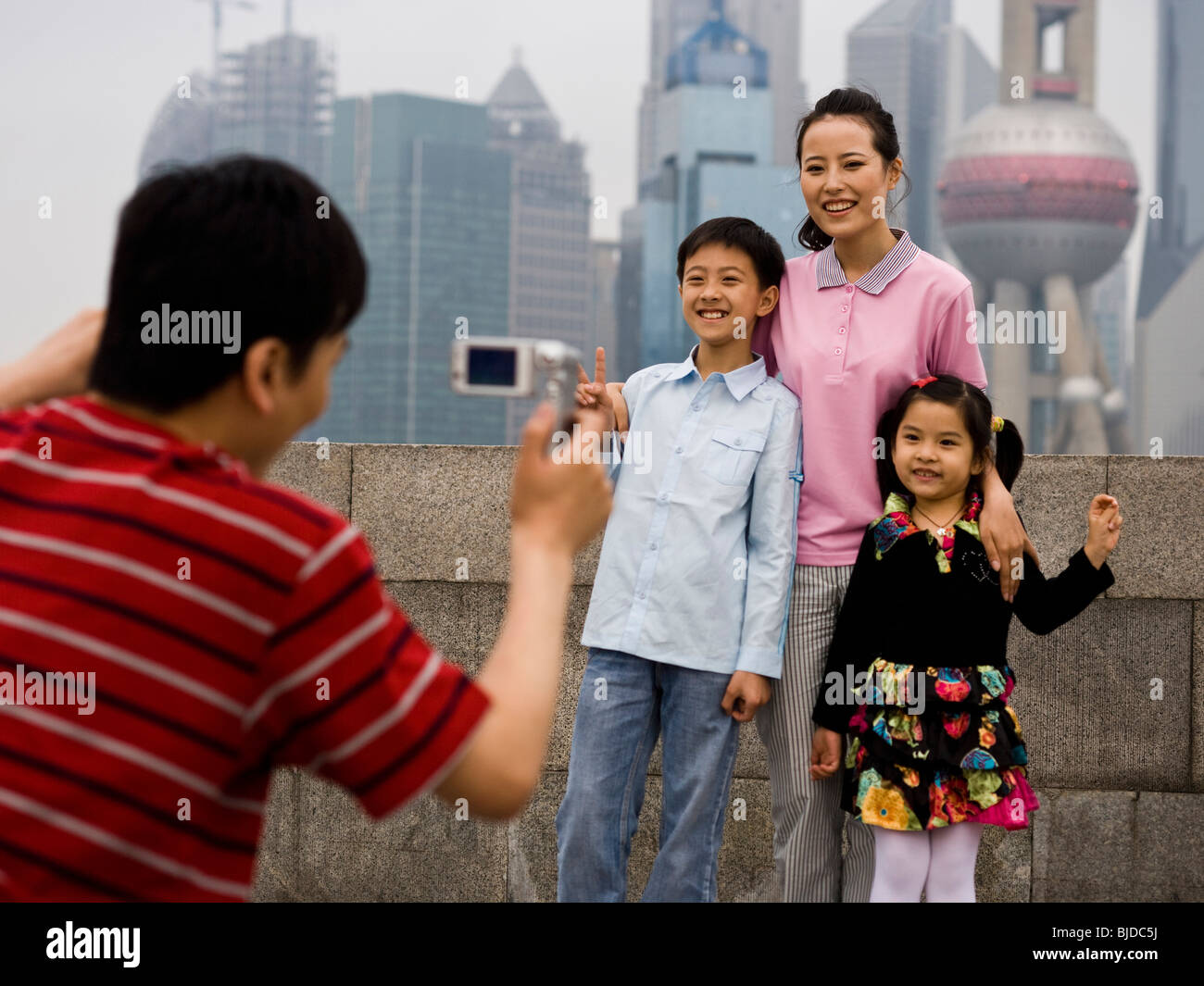 Family of four Stock Photo - Alamy