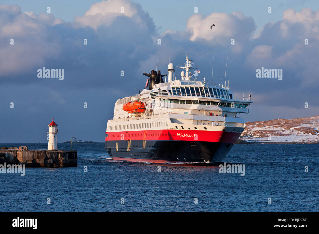 Polarlys enters Vardo harbour in the late afternoon Stock Photo - Alamy