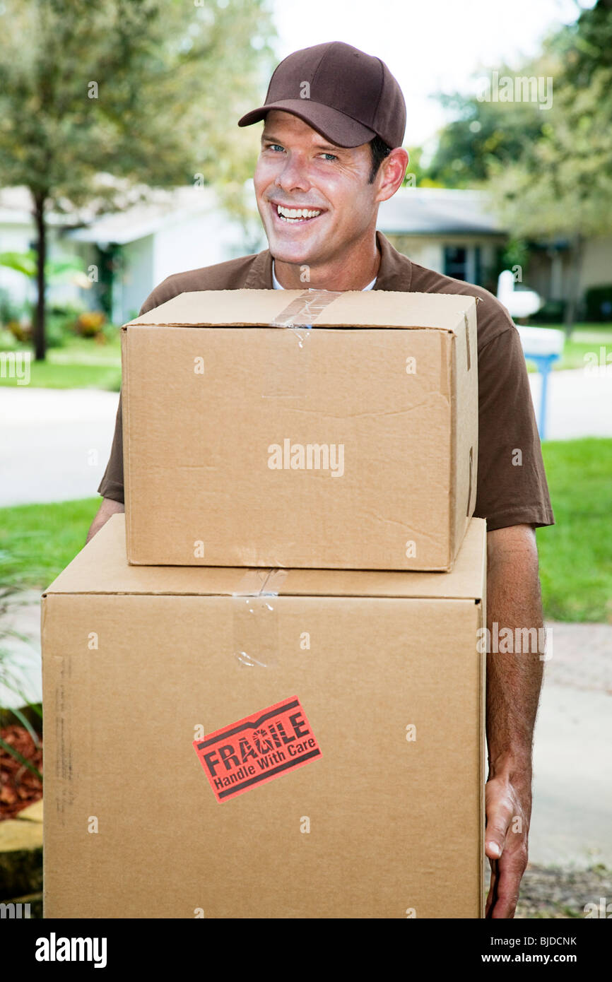 Man hand boxes packages hi-res stock photography and images - Alamy