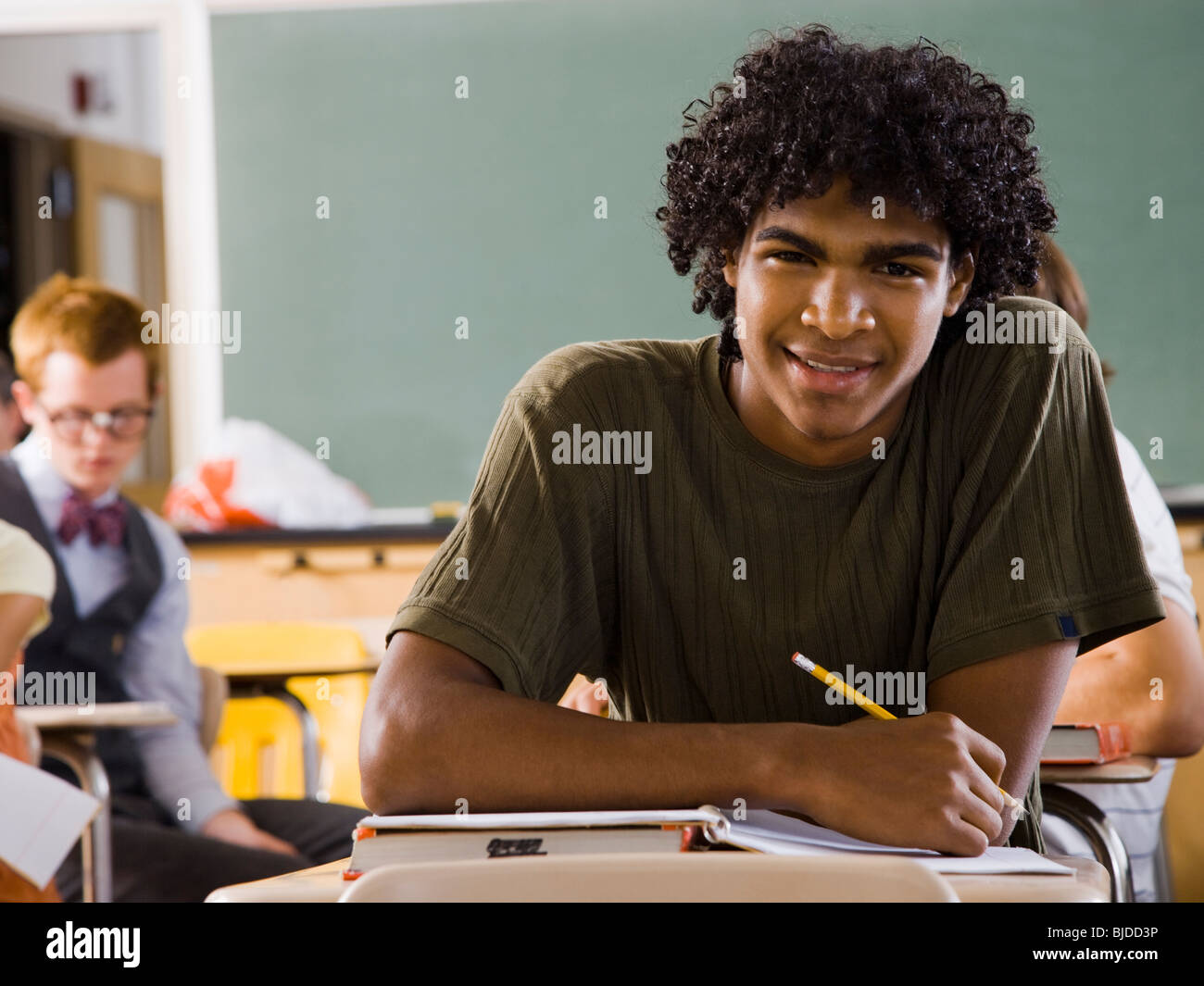 Student in a classroom Stock Photo - Alamy