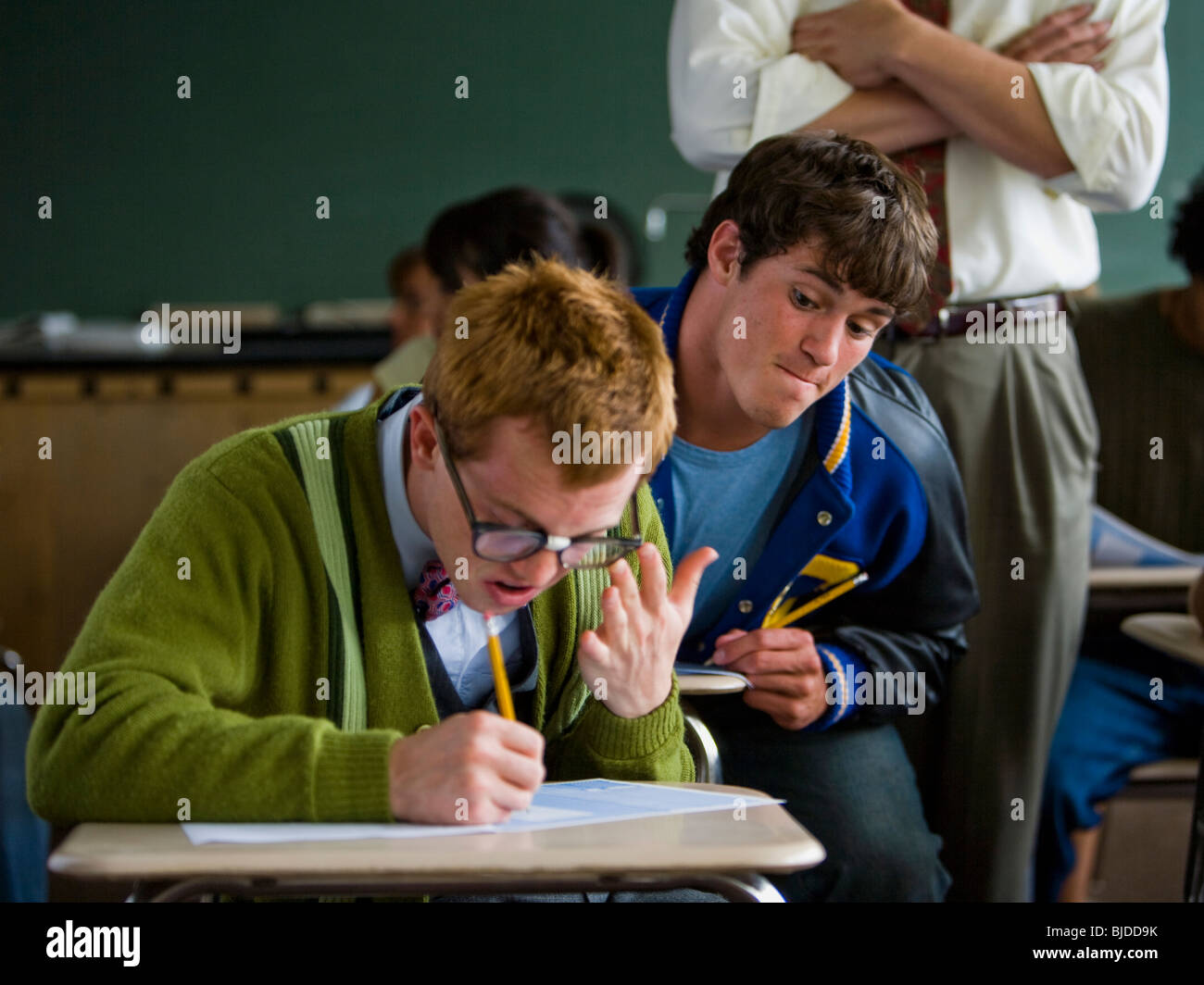 High School cheating off of a Nerd Stock Photo - Alamy