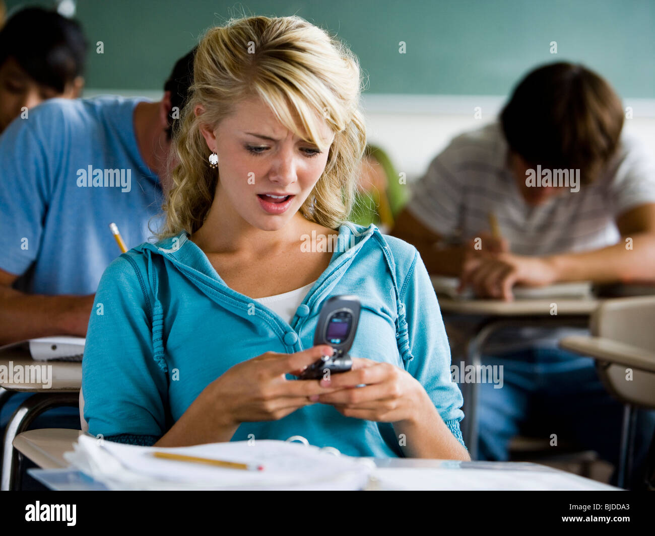 Student in a classroom Stock Photo - Alamy