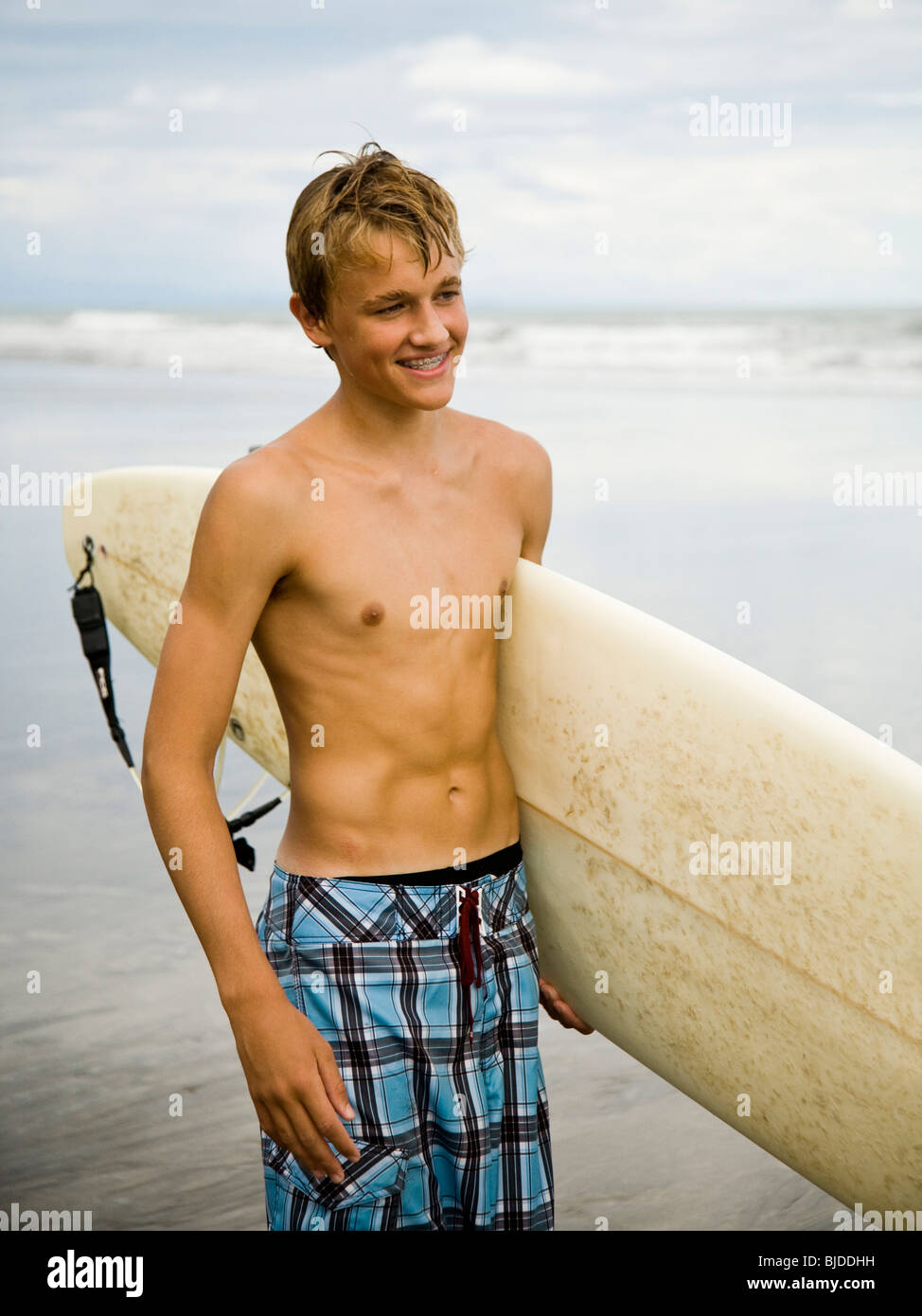 Boy at the beach Stock Photo - Alamy