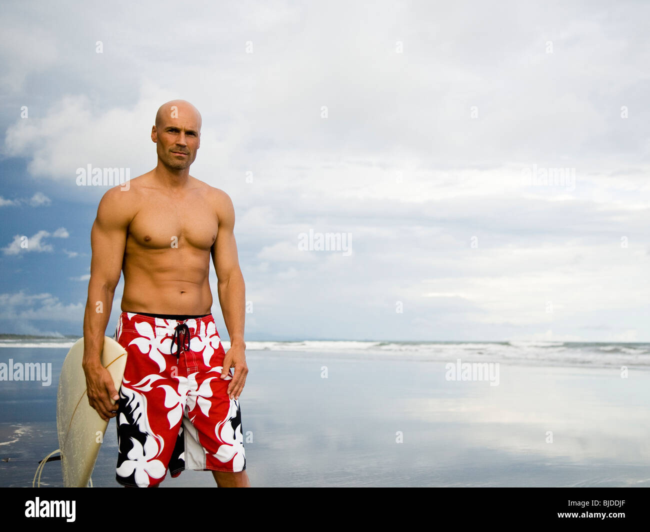 Man at the beach Stock Photo - Alamy
