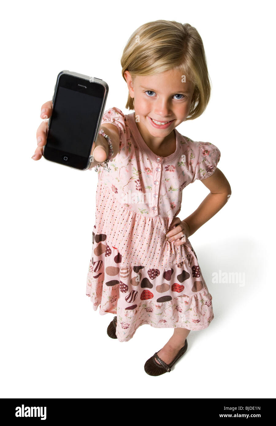 Little girl with an iPhone Stock Photo - Alamy