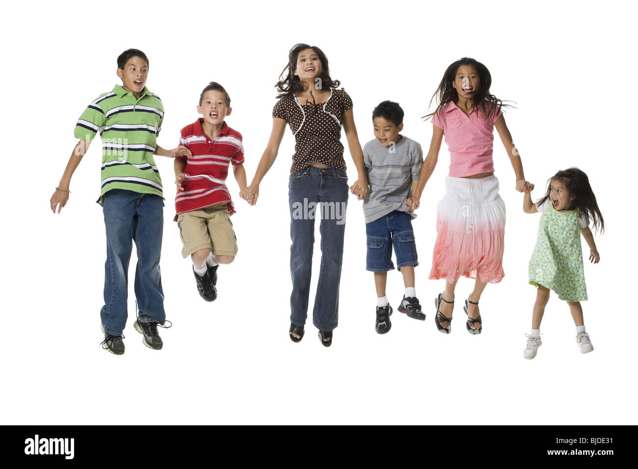 Family standing together Stock Photo - Alamy
