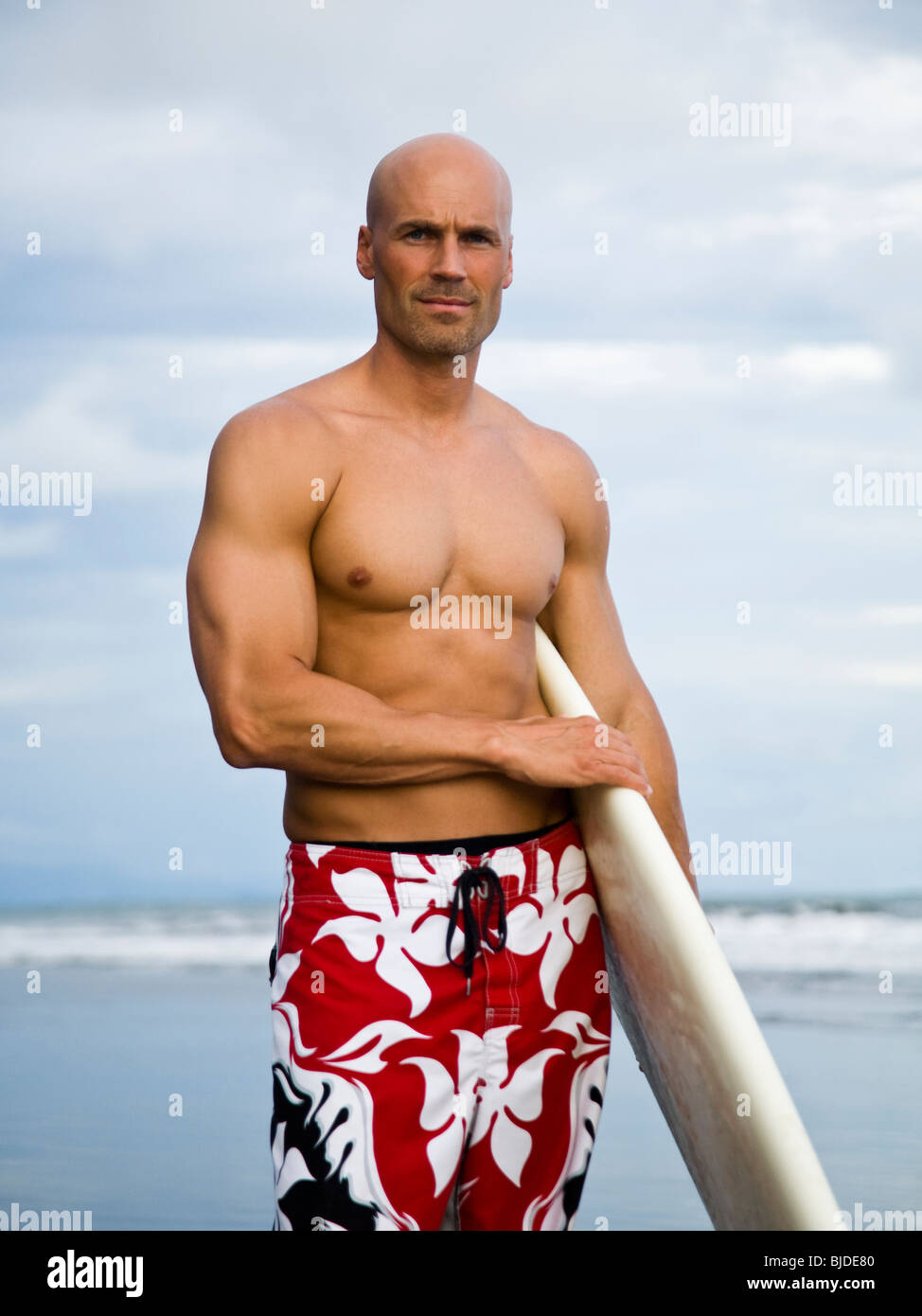 Man at the beach Stock Photo - Alamy