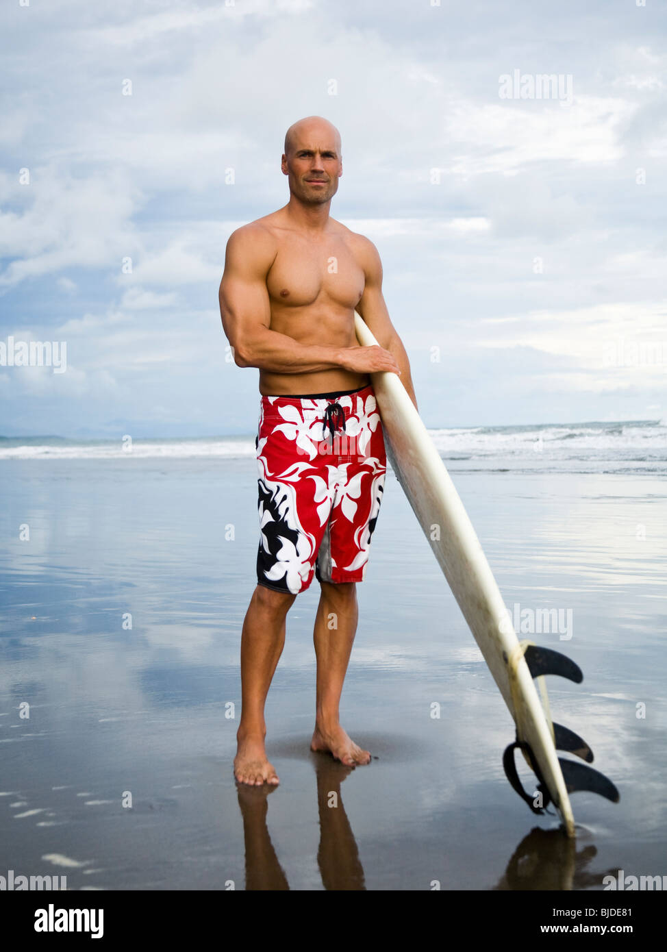 Man at the beach Stock Photo - Alamy