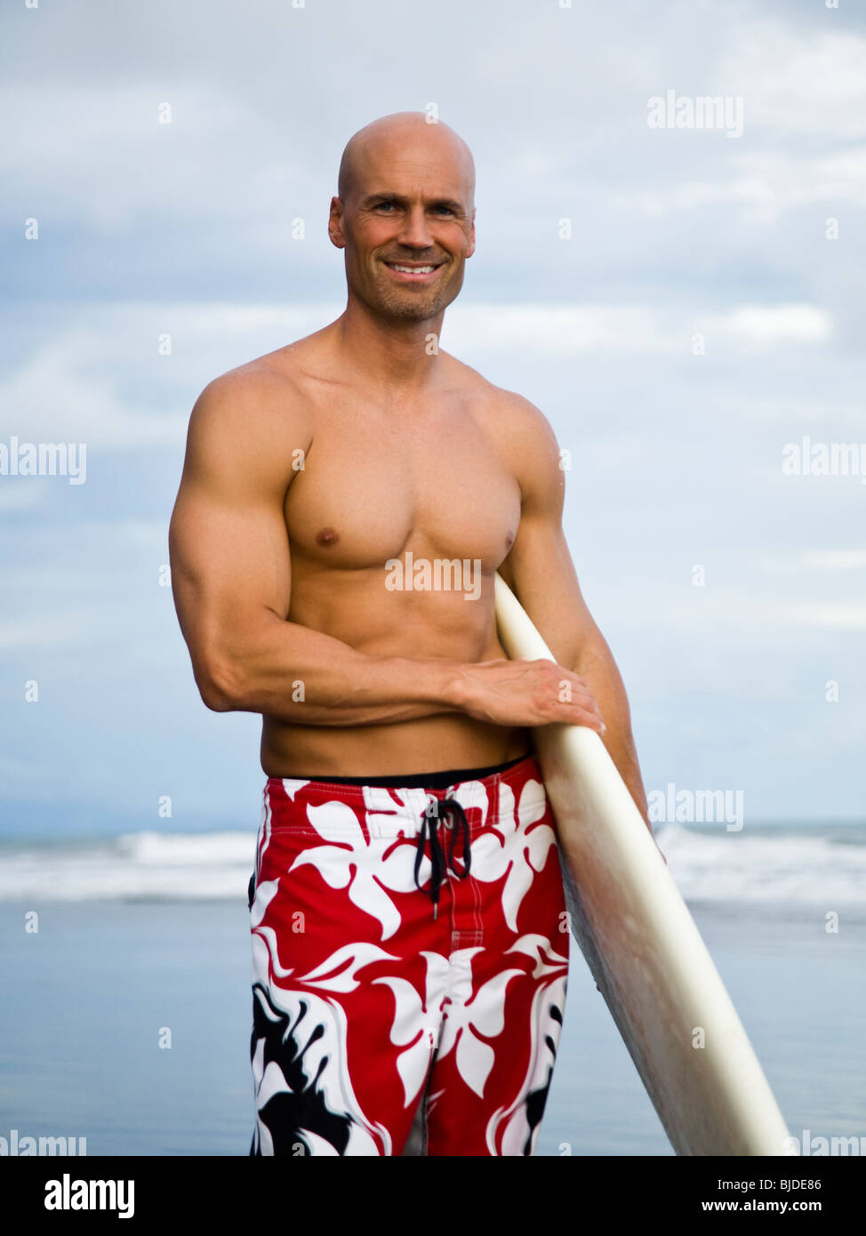 Man at the beach Stock Photo - Alamy