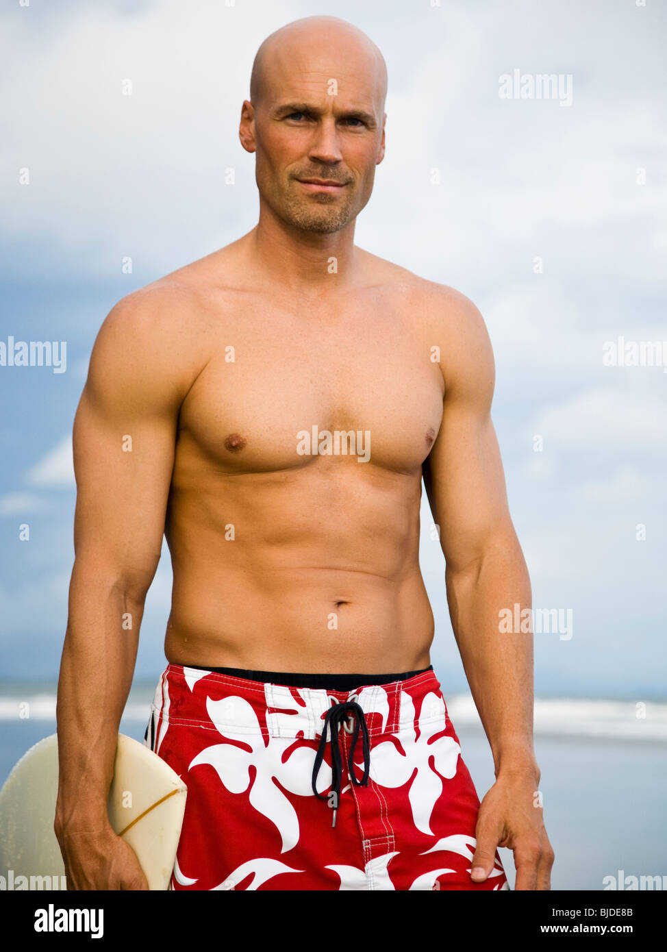 Man at the beach Stock Photo - Alamy
