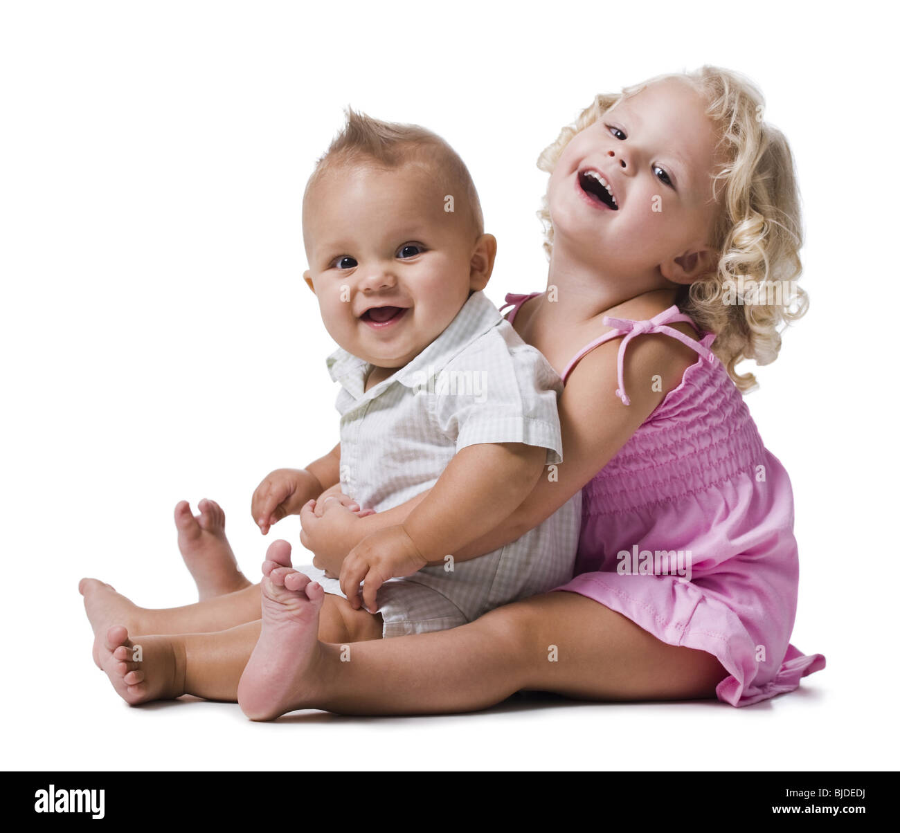 Toddler girl and baby boy Stock Photo - Alamy