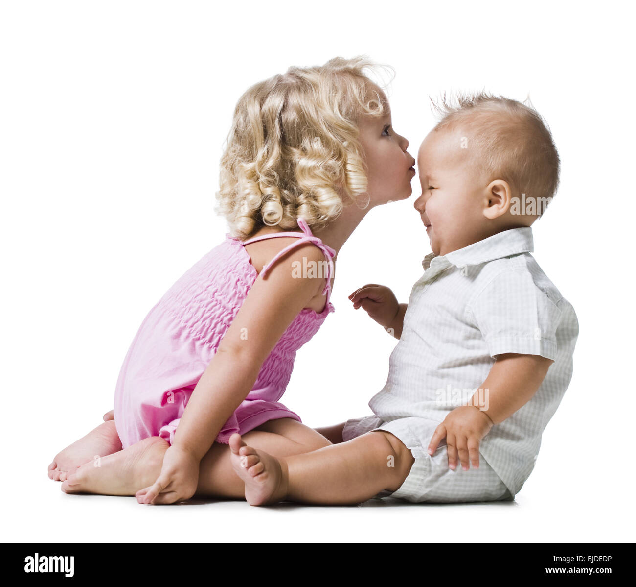 Toddler girl and baby boy Stock Photo - Alamy