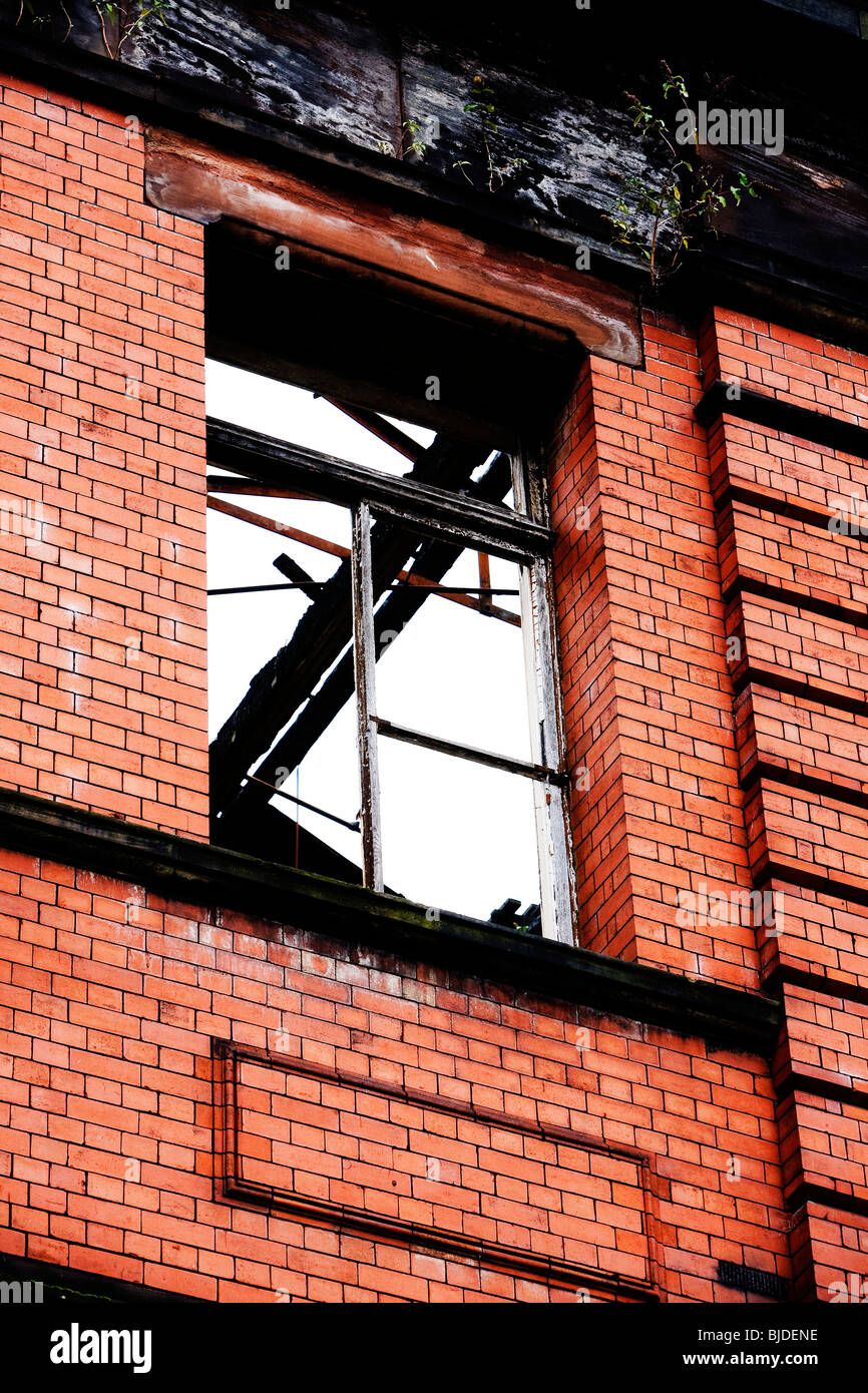 Low viewpoint of a broken window within a derelict factory Stock Photo ...