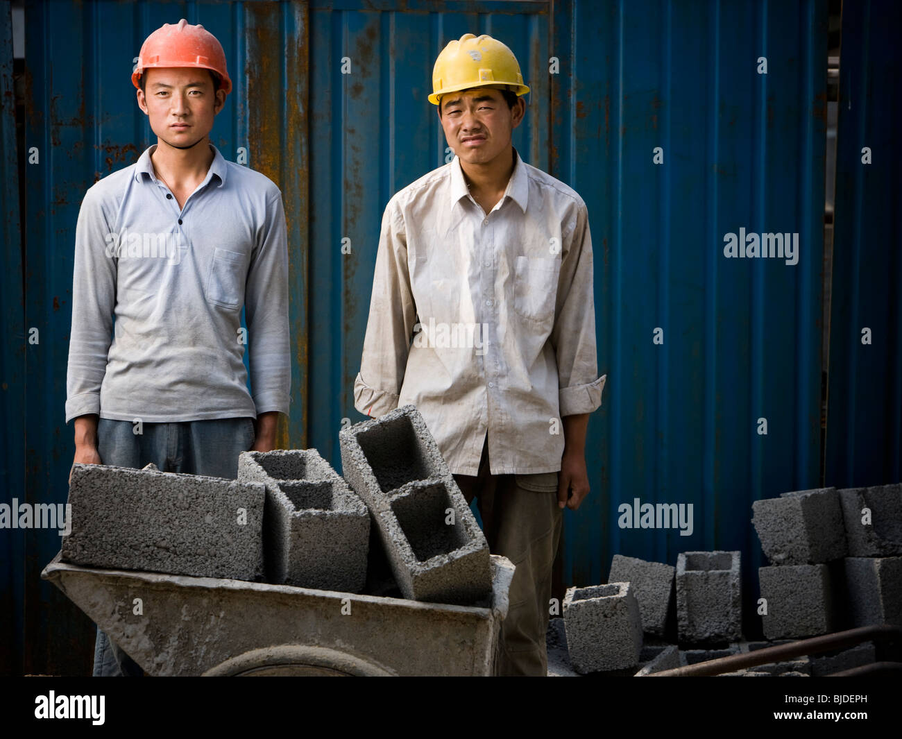 Two costruction workers on the job site Stock Photo - Alamy