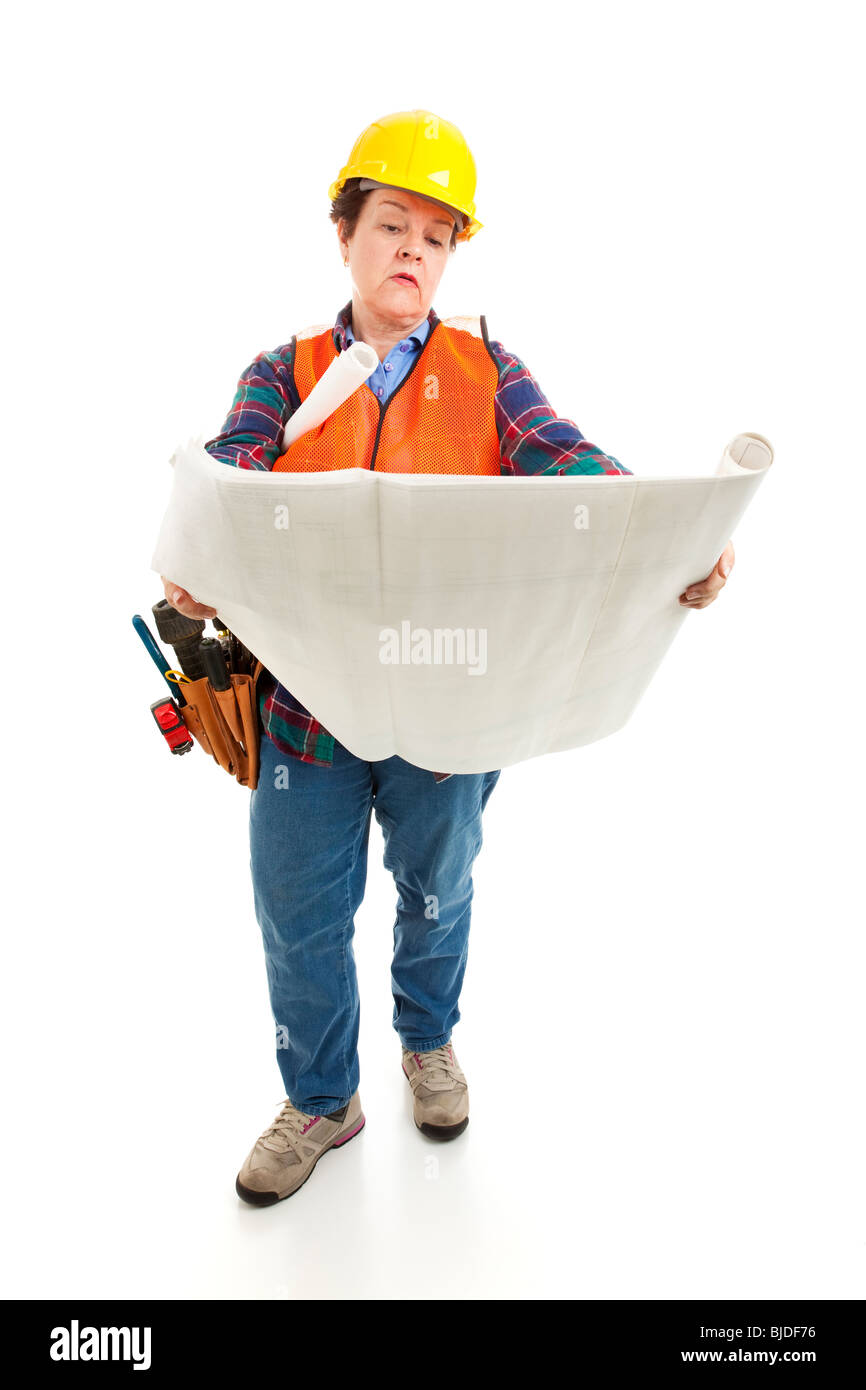Female contractor reading blueprints. Full body isolated on white Stock ...