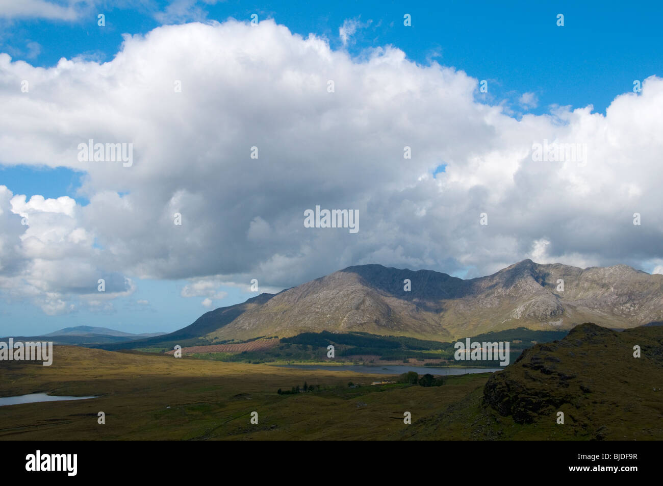 The Twelve Bens range over Lough Inagh, from the Maumturk Mountains ...