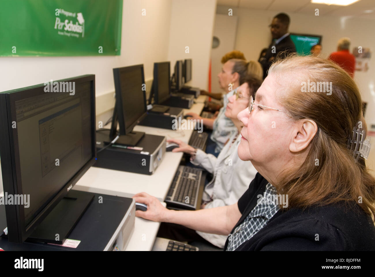 Senior citizens use computers at a senior center in the Bronx borough ...