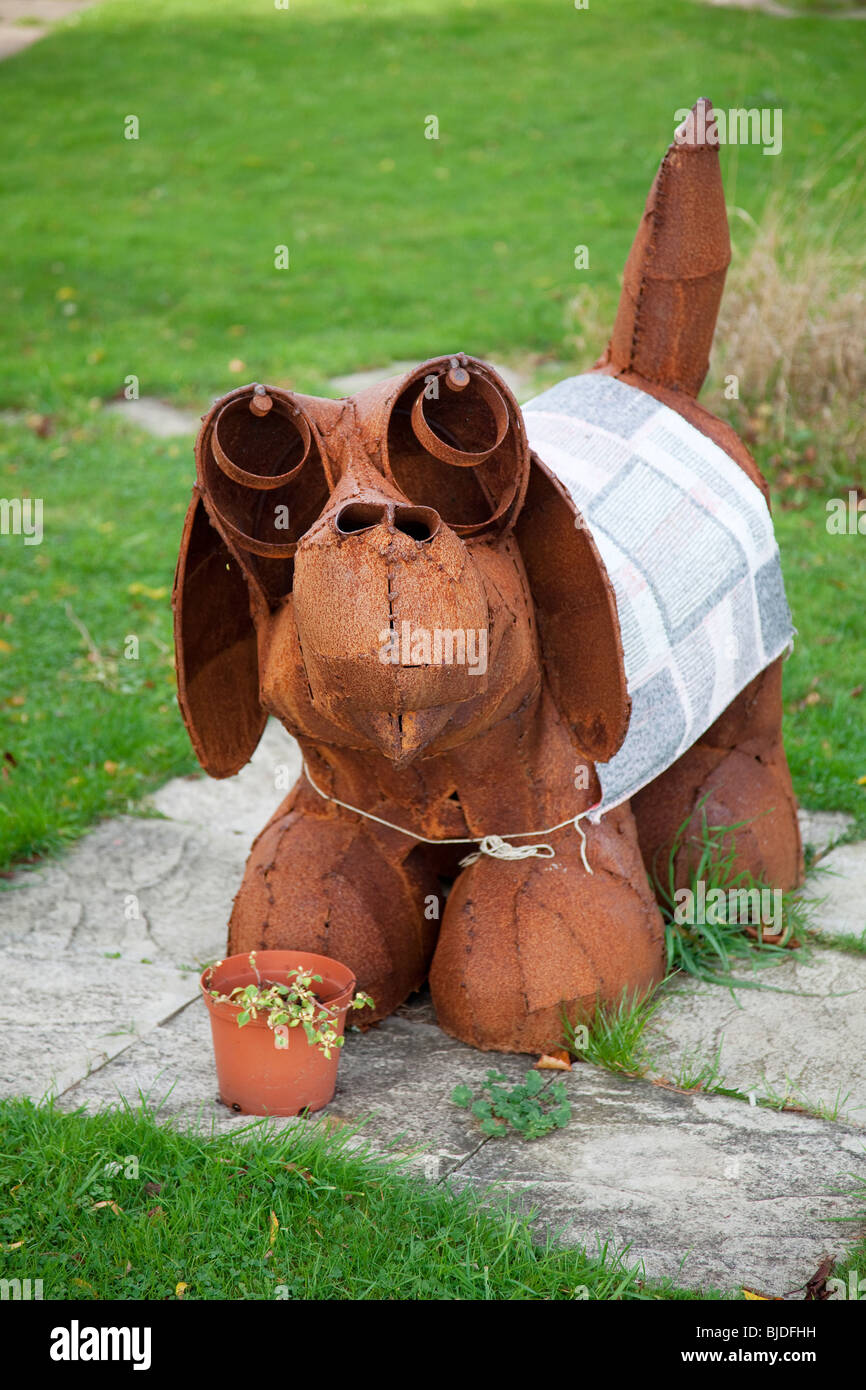 Rusty dog metal sculptures Stock Photo - Alamy