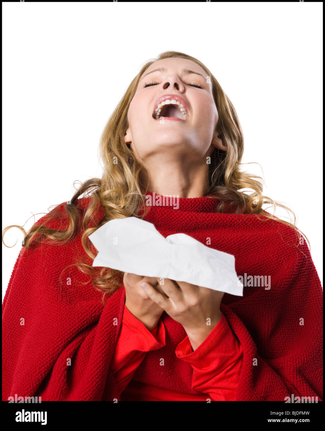 young woman sneezing Stock Photo - Alamy