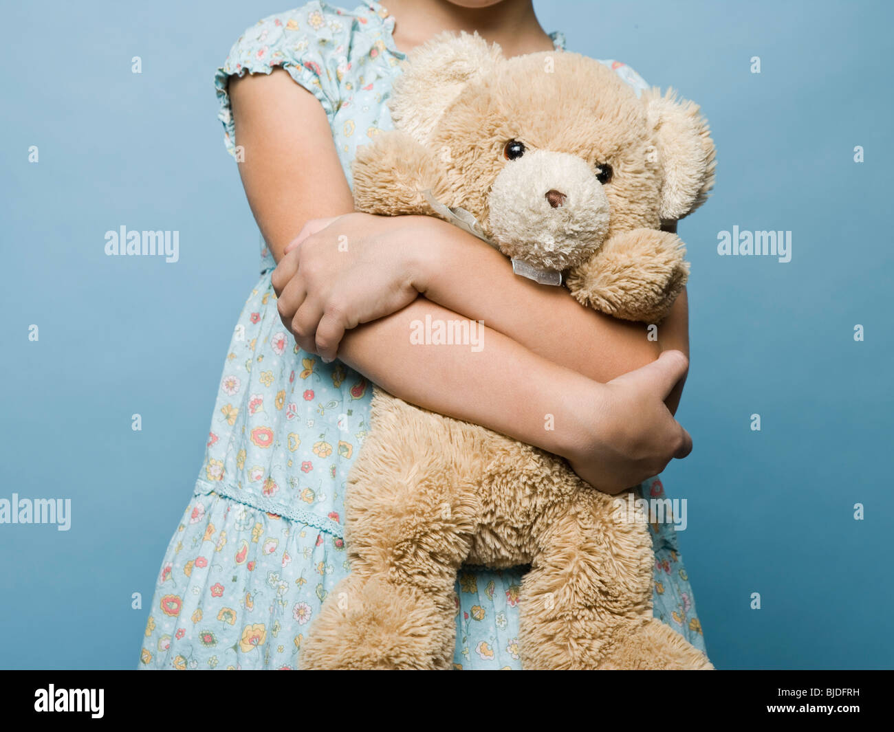 girl hugging teddy bear Stock Photo - Alamy