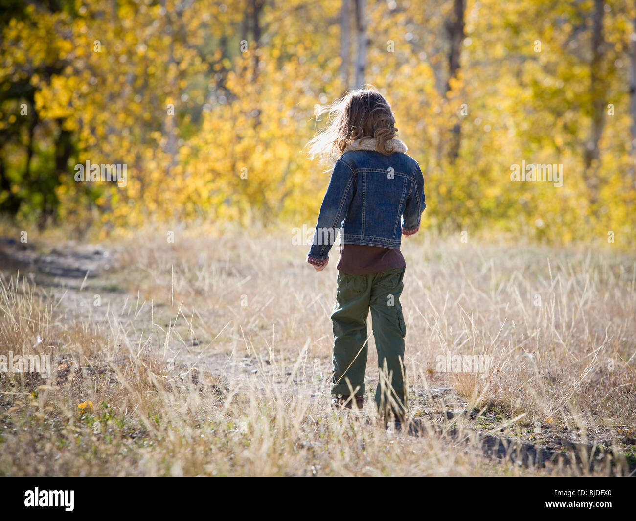 girl walking outside Stock Photo - Alamy