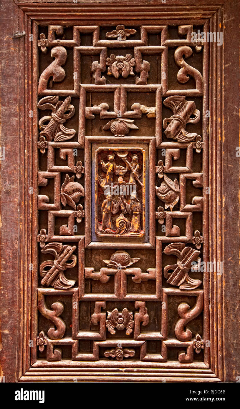 A Chinese handcrafted wood sculpture window panel Stock Photo - Alamy
