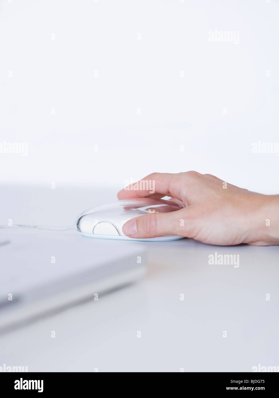 hand on mouse Stock Photo - Alamy