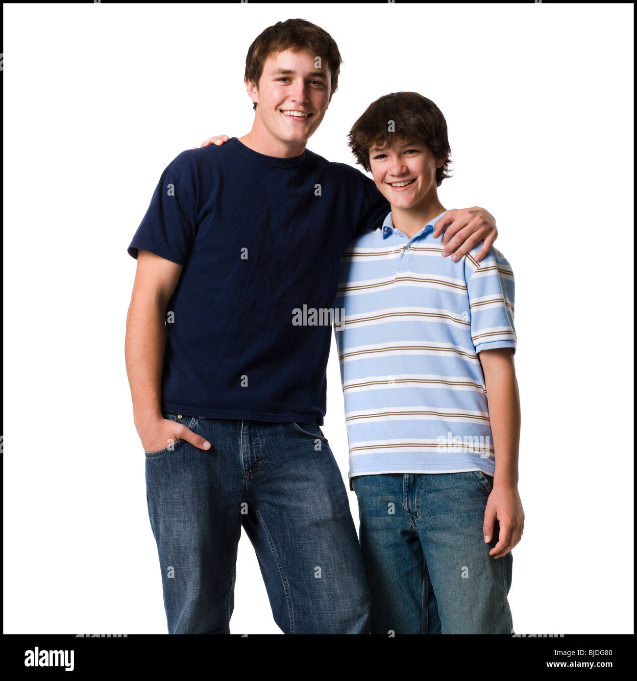 older boy with arm around younger boy Stock Photo - Alamy