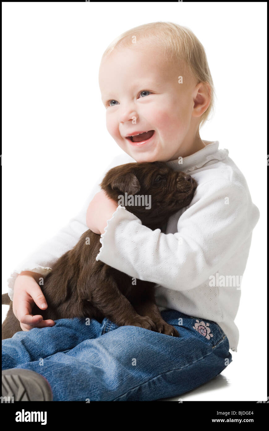 Child and her puppy hi-res stock photography and images - Alamy